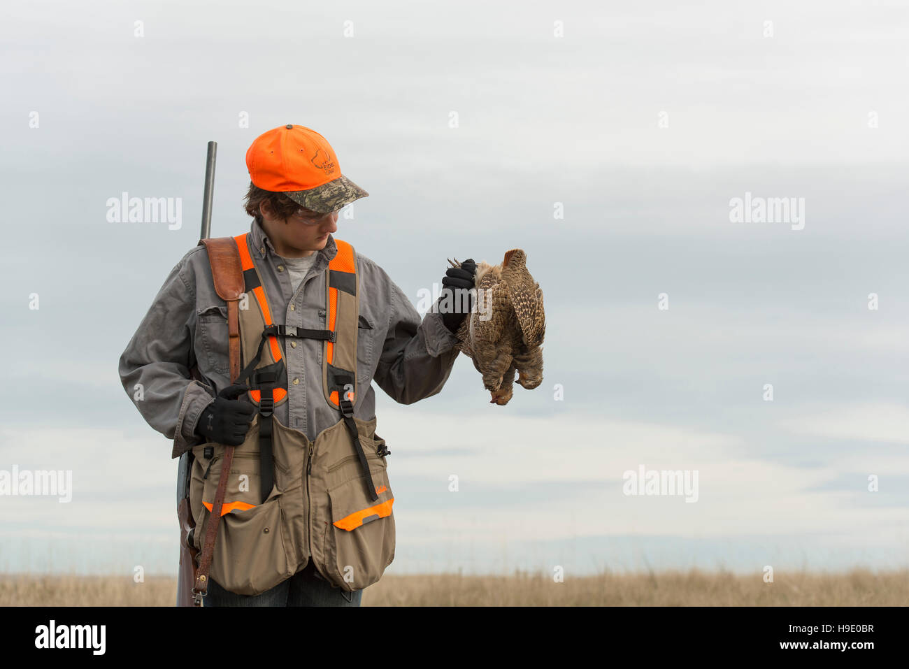 A hunter with Hungarian Partridge Stock Photo - Alamy
