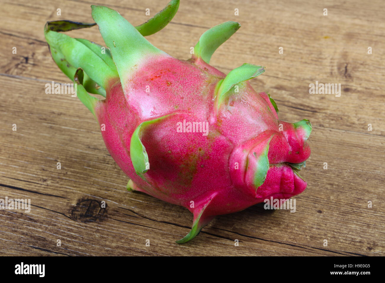 Dragonfruit - asian fruit on the wood background Stock Photo - Alamy