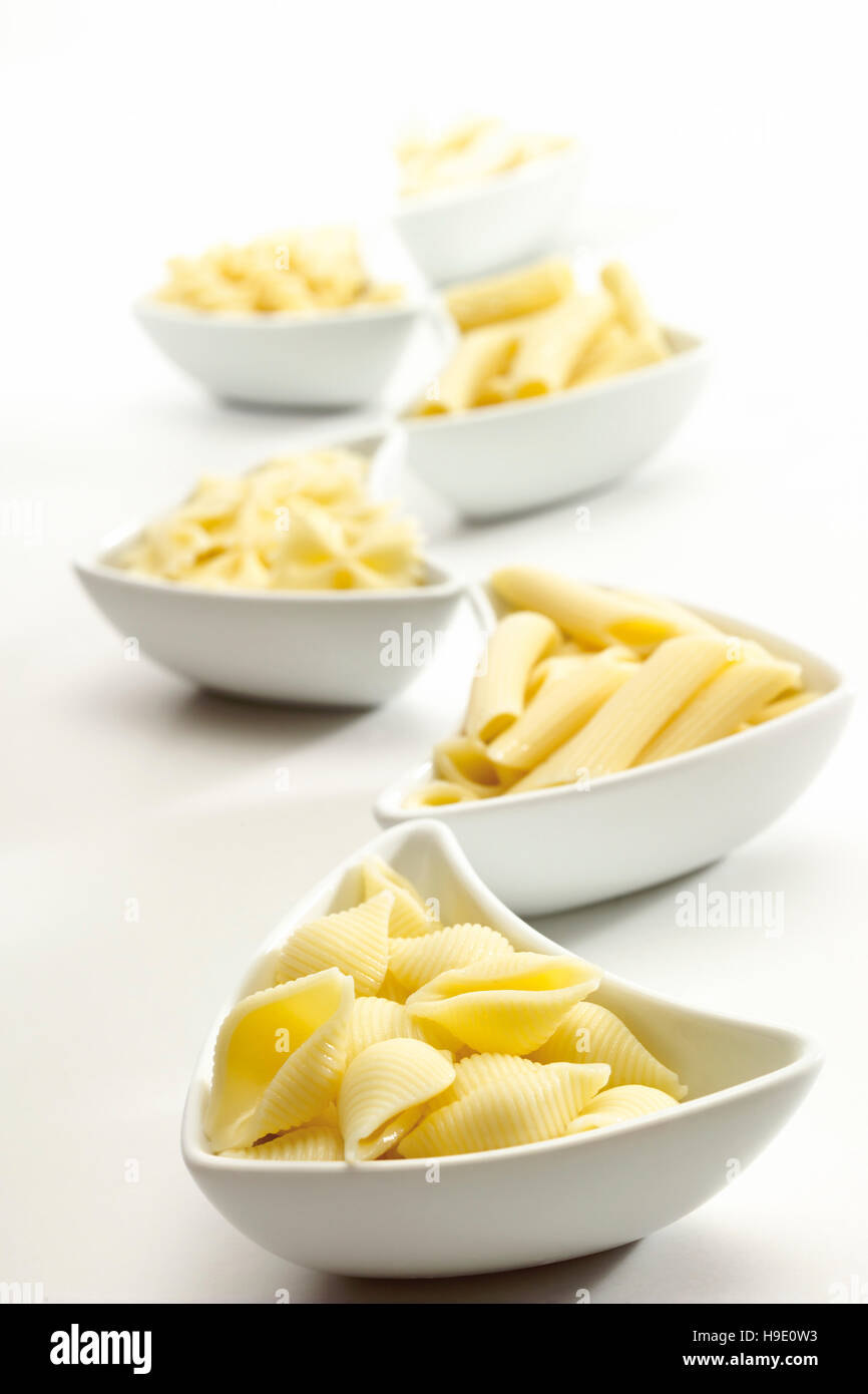 Pasta, conchiglie, penne, boiled Stock Photo - Alamy