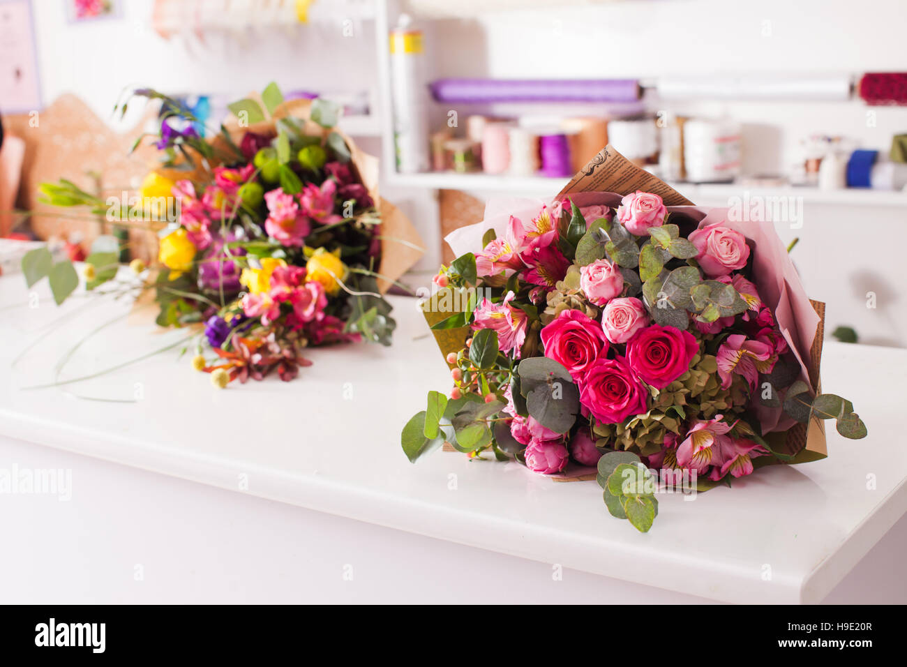 Finished bouquets on the table Stock Photo - Alamy