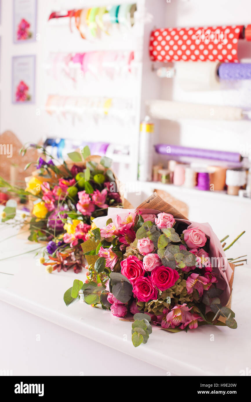 Finished bouquets on the table Stock Photo - Alamy
