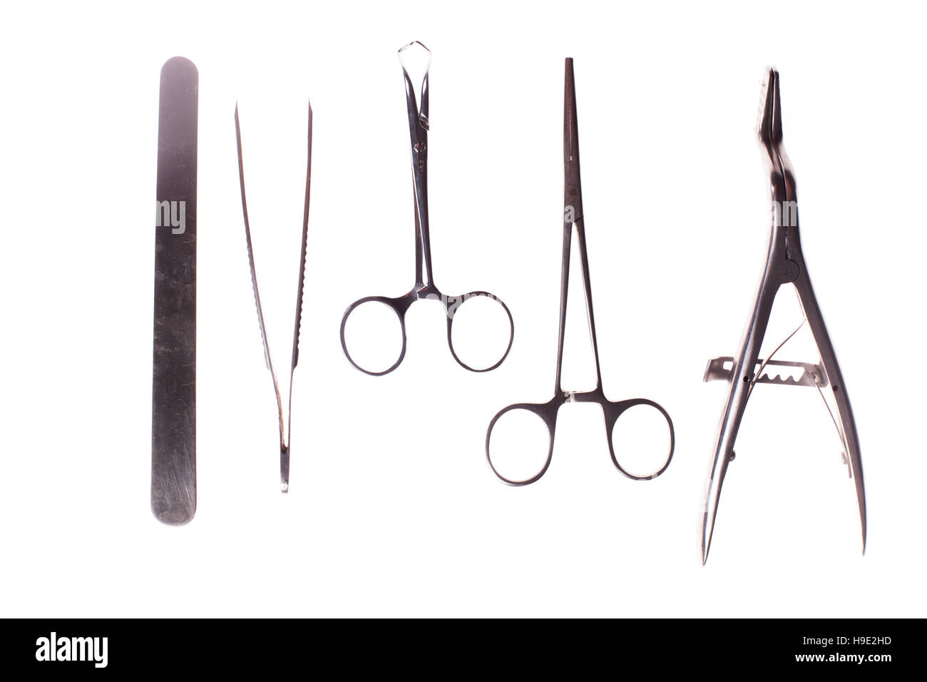 surgery instruments isolated on white Stock Photo - Alamy