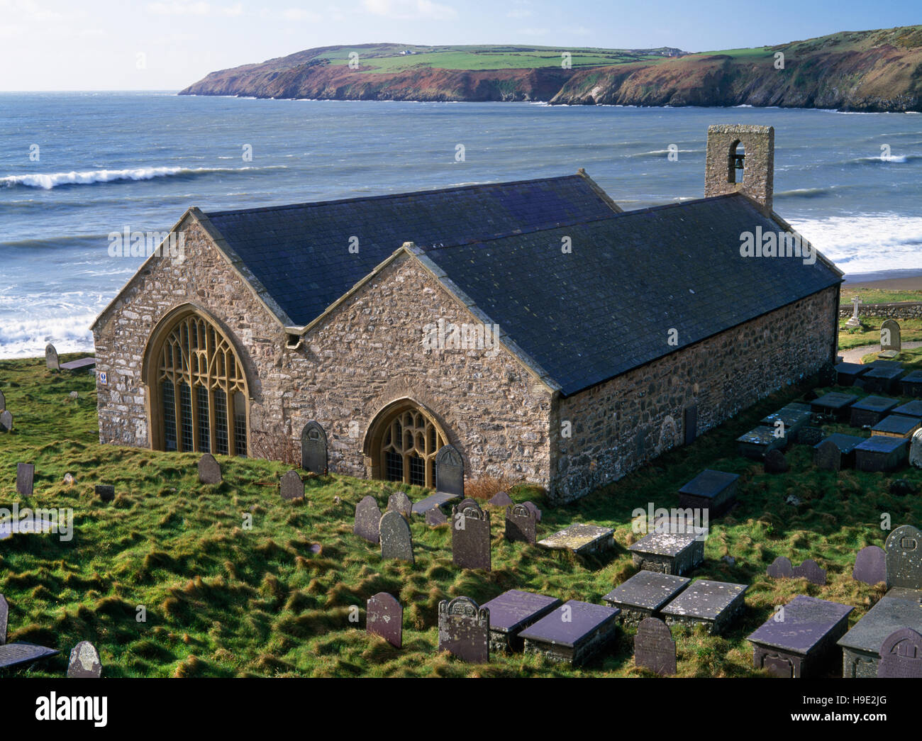 View SW over churchyard & twin aisles of St Hywyn's Church, Aberdaron ...