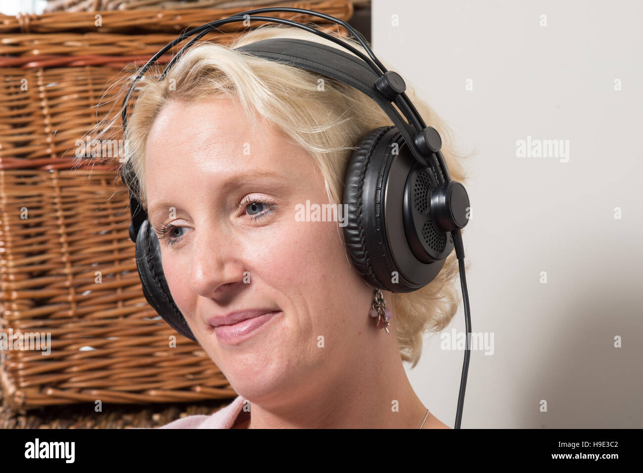 Woman wearing large headphones hi-res stock photography and images - Alamy