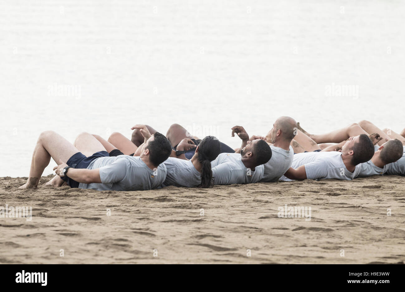 Soldiers working out on beach in Spain Stock Photo - Alamy