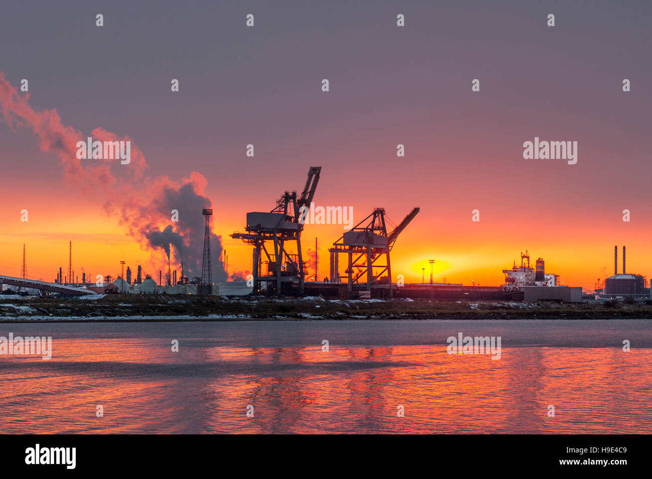 Sunset at Hartlepool Docks, Dock Cranes; Symmetrical towers, chimneys ...