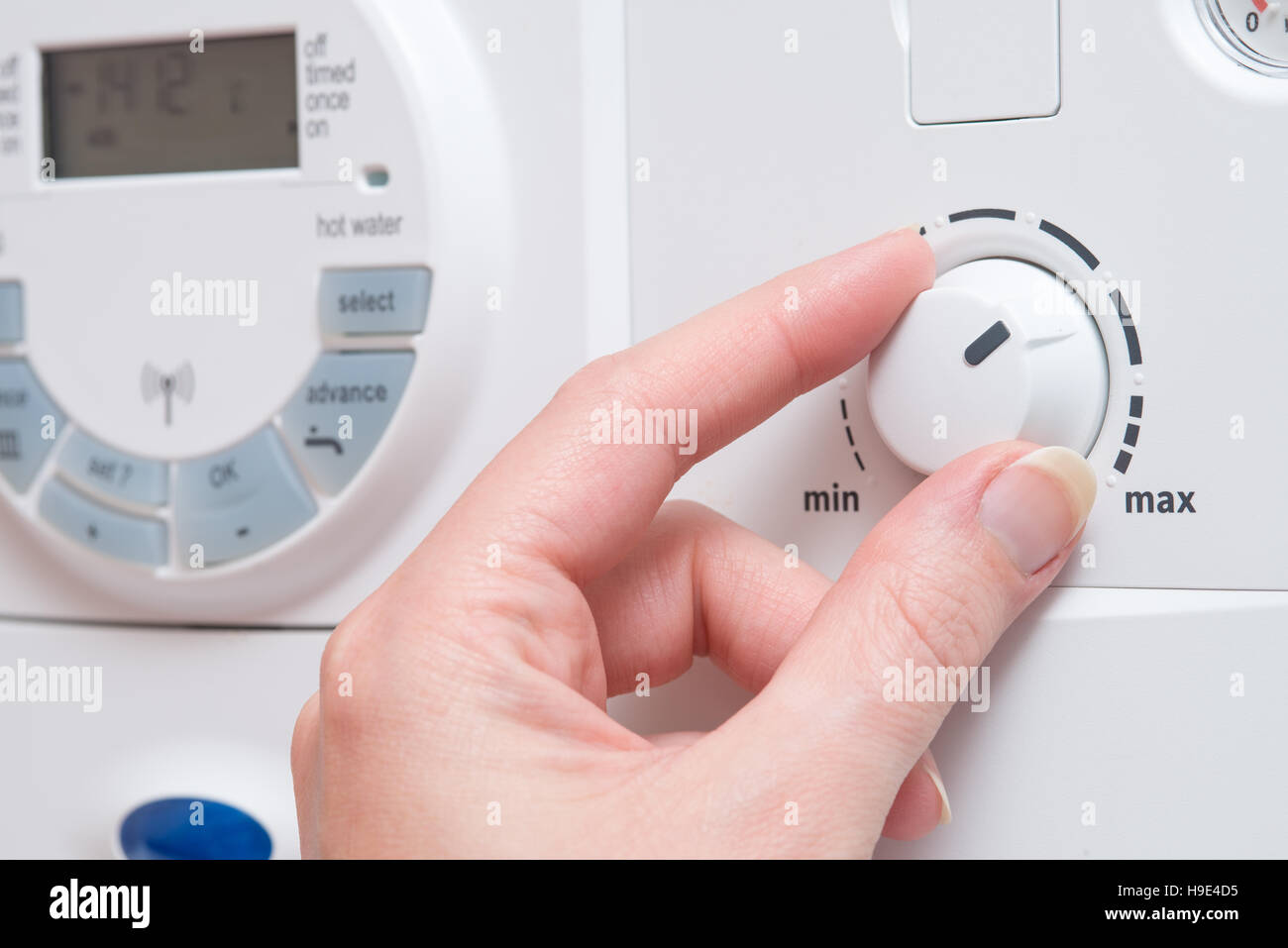 Hand turning switch on gas hi-res stock photography and images - Alamy