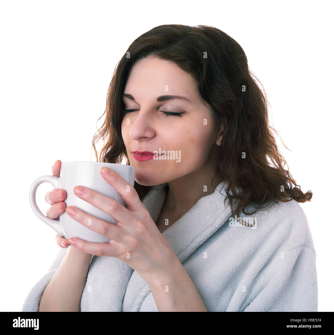 Woman in spa robe holding hi-res stock photography and images - Alamy