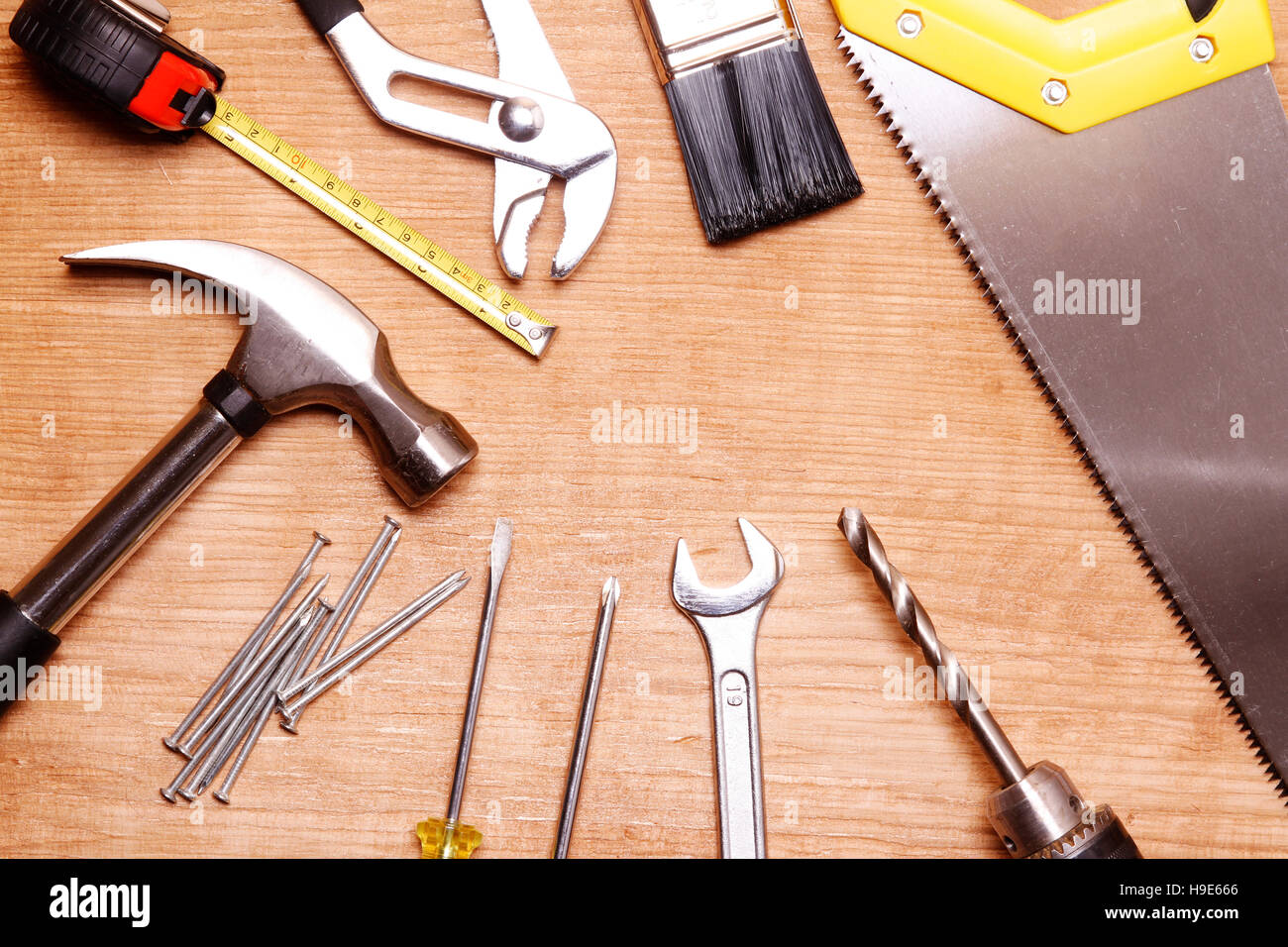 Assorted work tools on wood Stock Photo - Alamy
