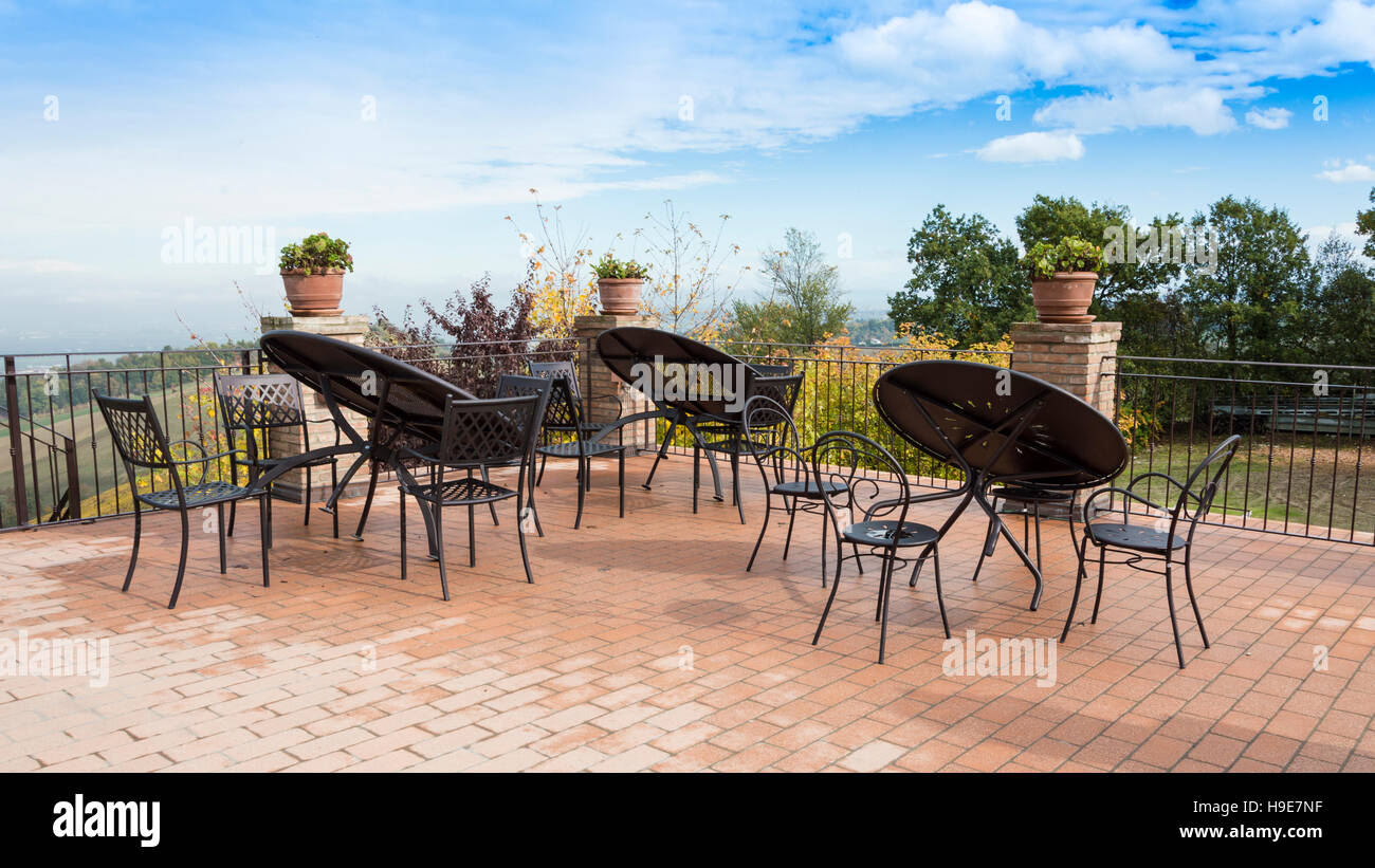 Chairs and tables of a beautiful resort in Italian countryside Stock ...