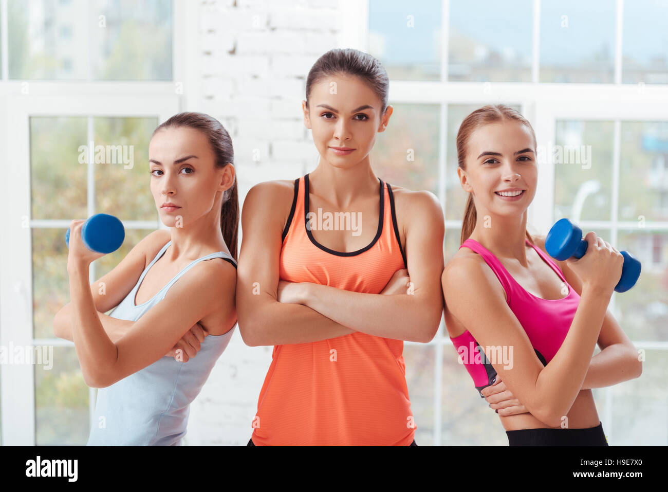 Joyful group three young women hi-res stock photography and images - Alamy