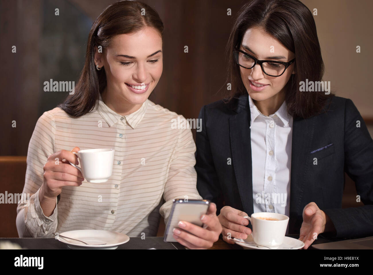 Women having tea break at office hi-res stock photography and images ...