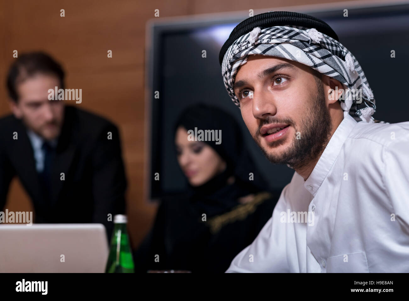 Handsome bearded Muslim watching aside Stock Photo - Alamy