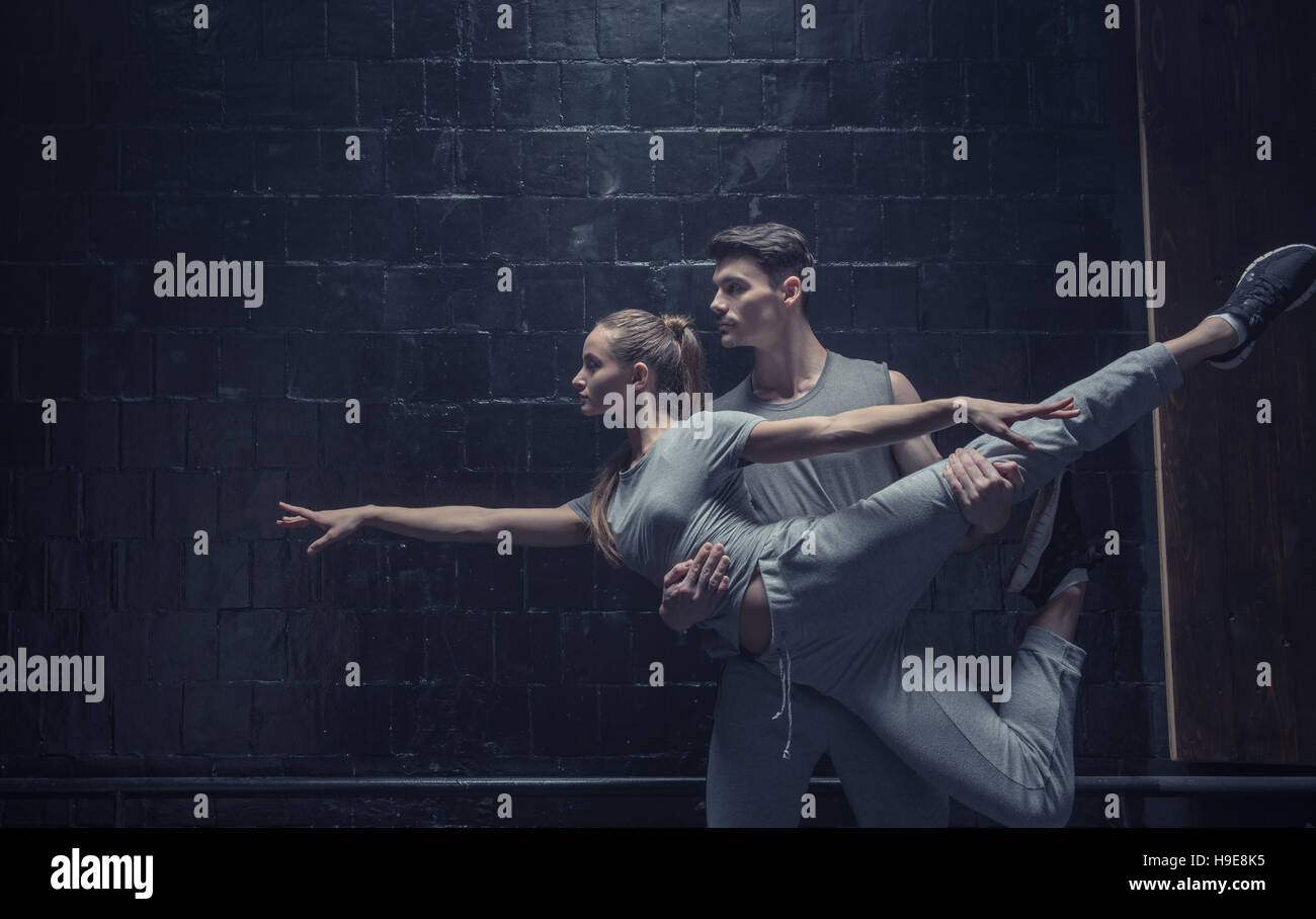Graceful young dancers posing together Stock Photo - Alamy