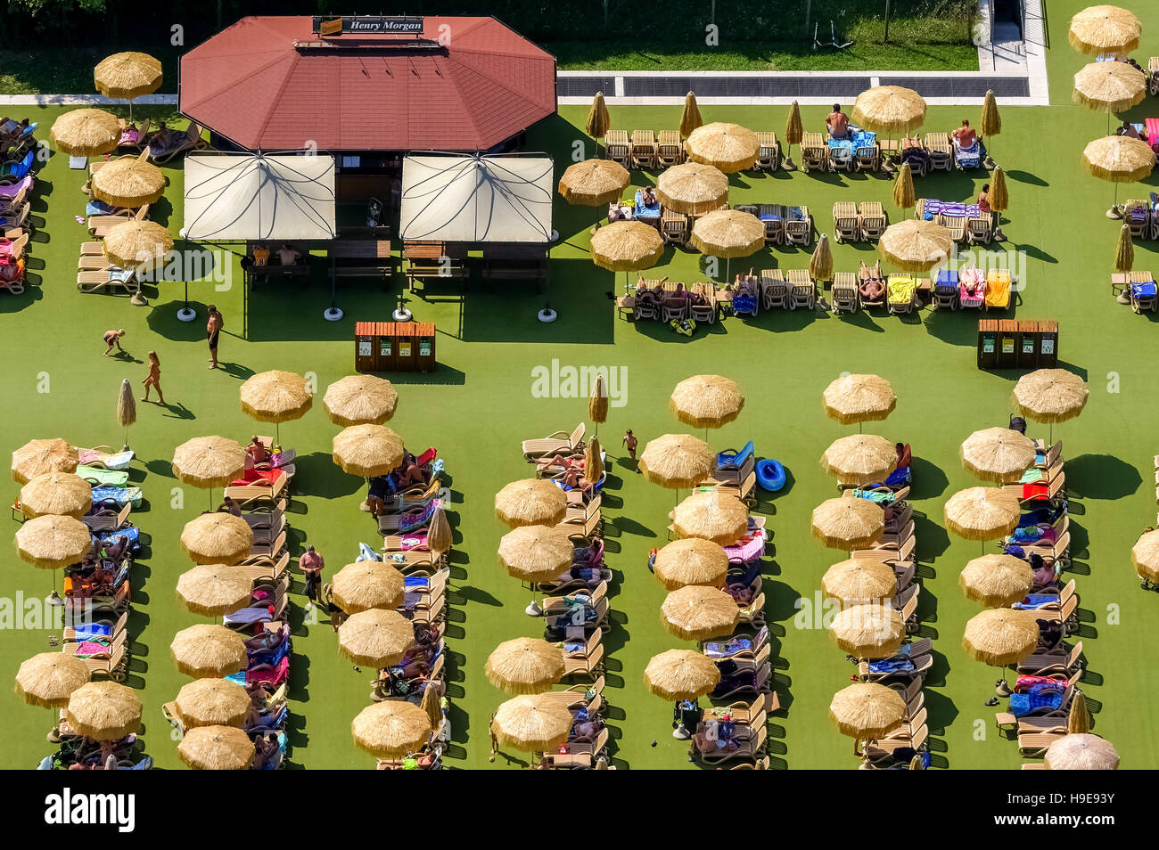 Aerial, Swimming pool with sun terrace and sunshades, camping guests ...