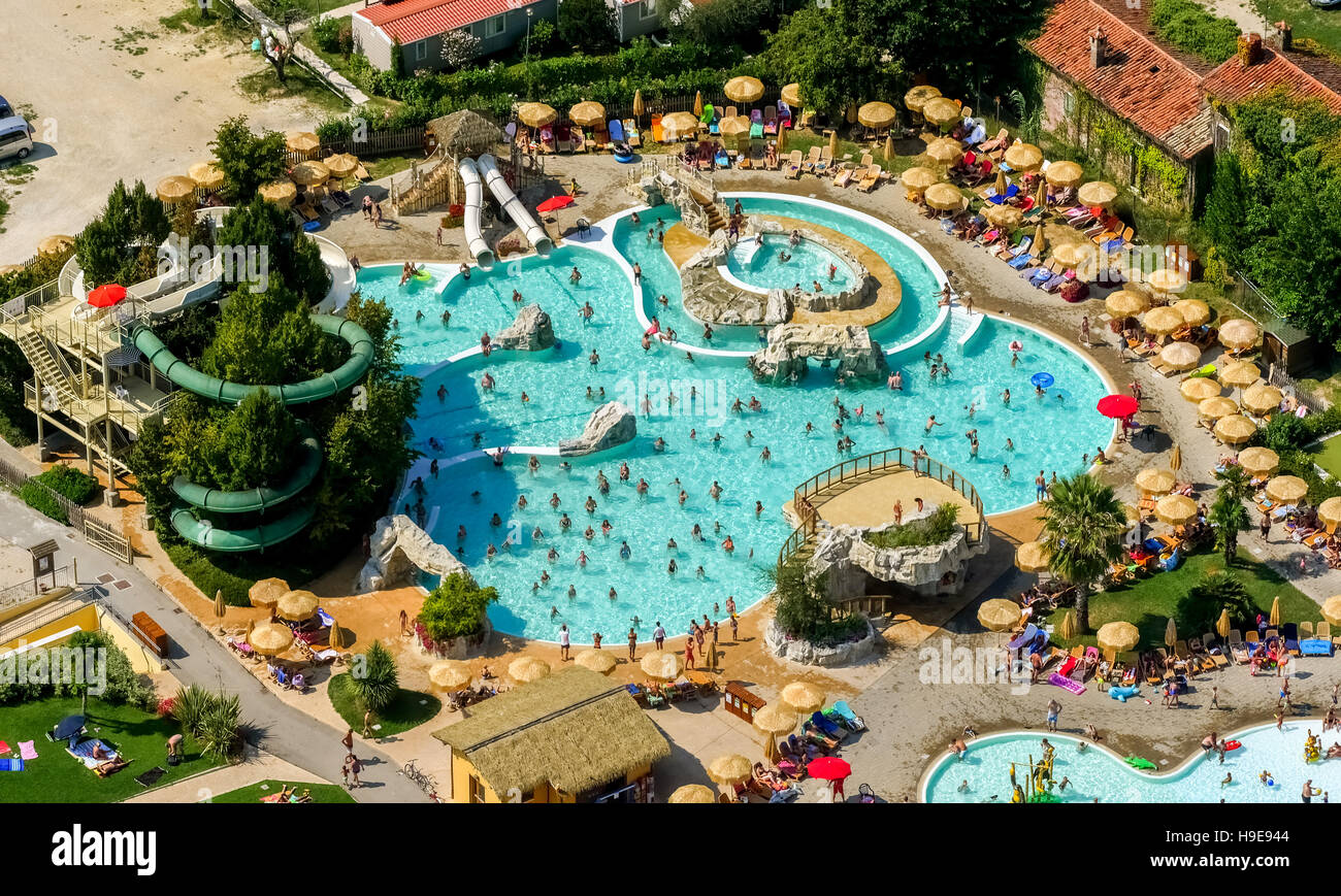 Aerial, Swimming pool with sun terrace sunshades, camping guests ...