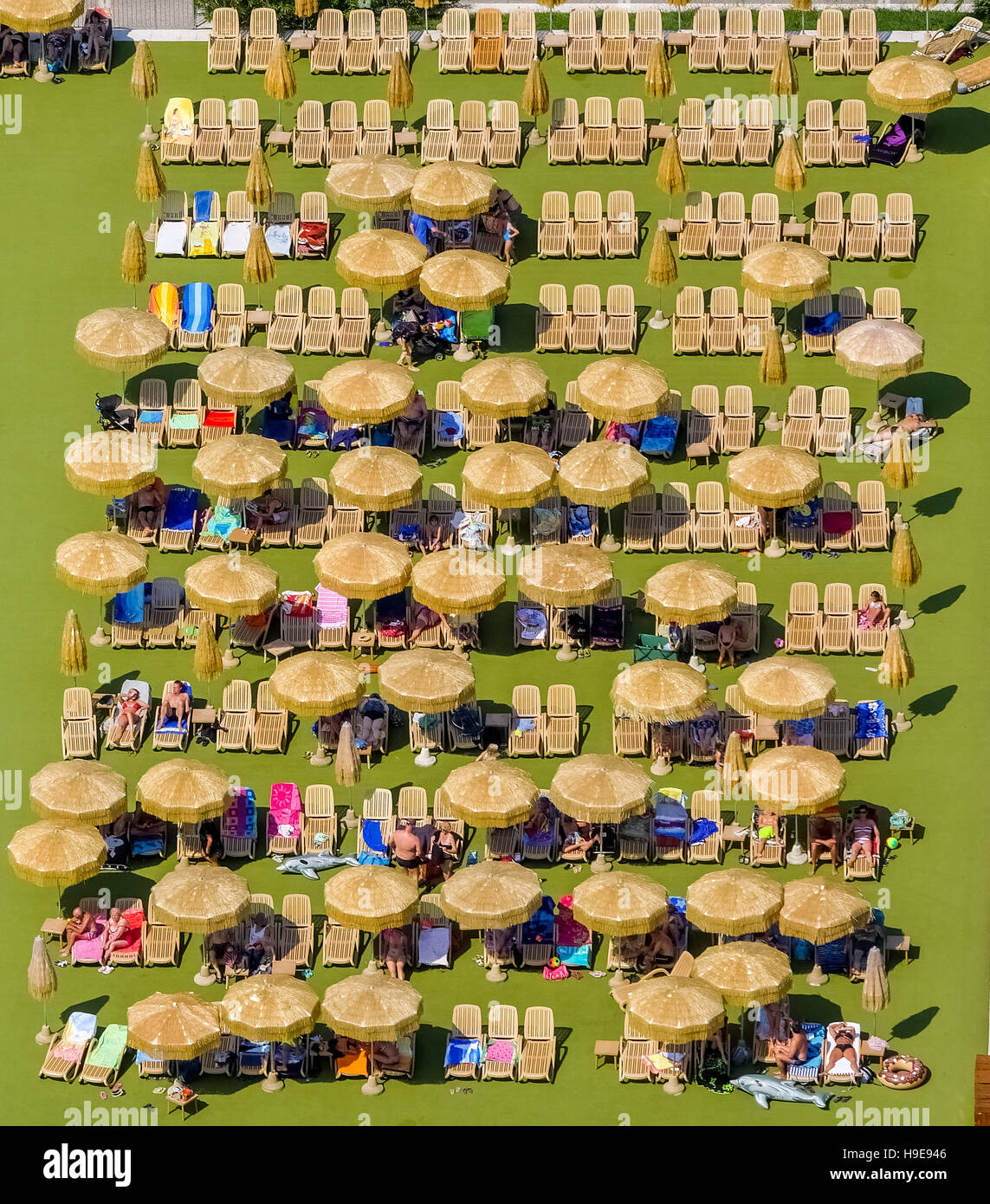 Aerial, Swimming pool with sun terrace and sunshades, camping guests ...