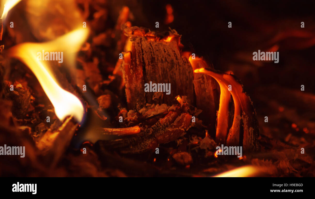 Piles of scrap wood charcoal burning on fire. Macro photography ...