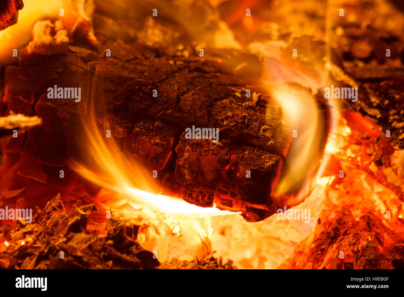Piles of scrap wood charcoal burning on fire. Macro photography ...