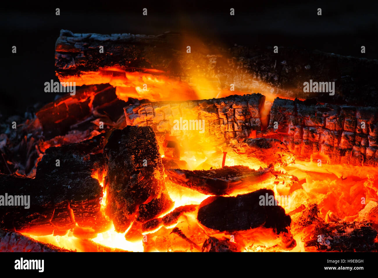 Piles of scrap wood charcoal burning on fire. Macro photography ...