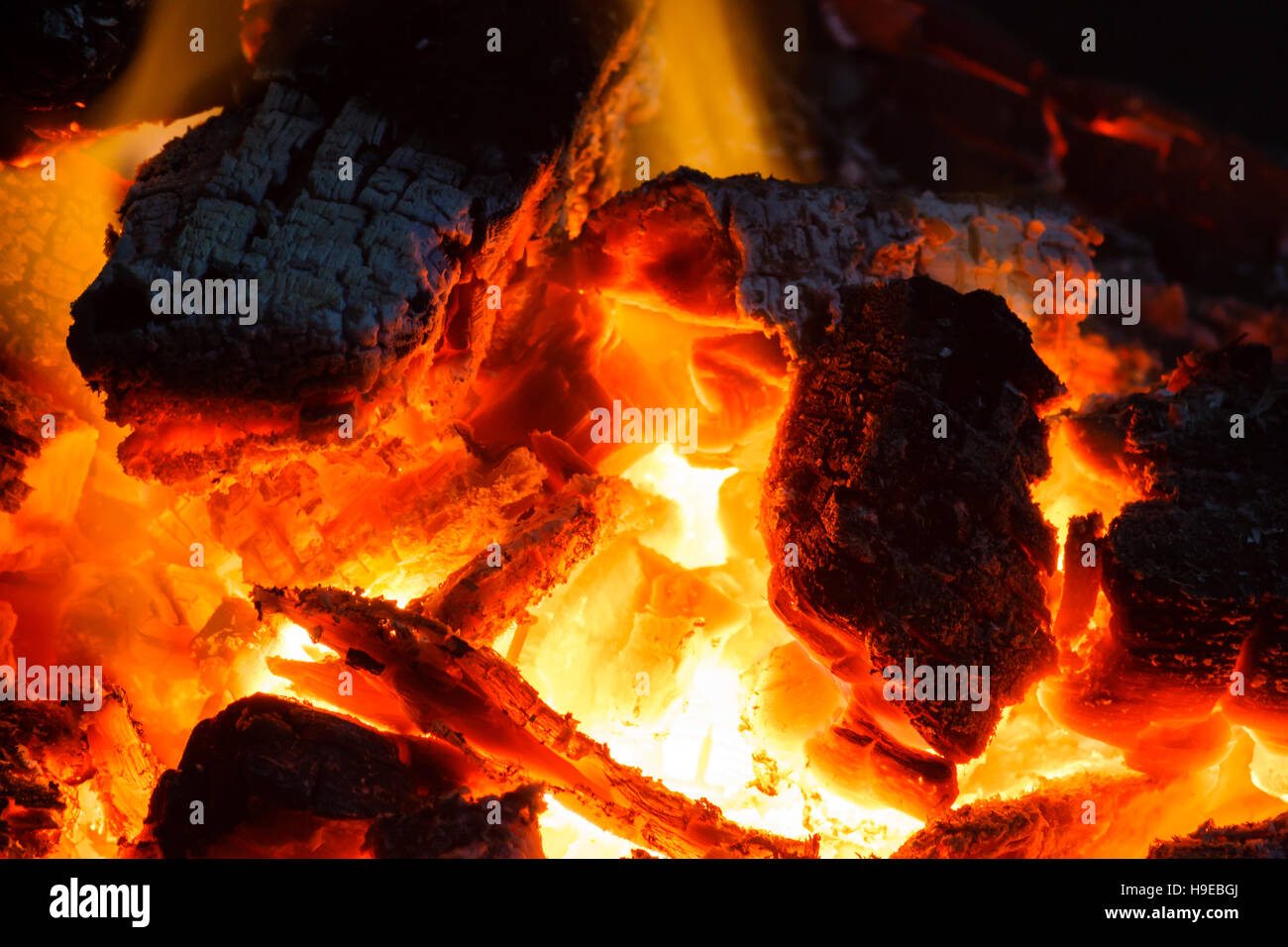 Piles of scrap wood charcoal burning on fire. Macro photography ...