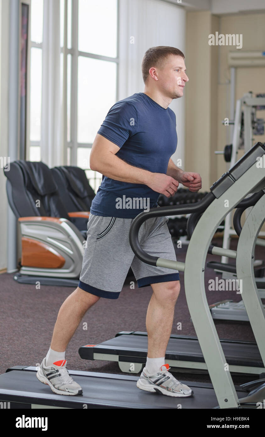 Guy running on treadmill hi-res stock photography and images - Alamy