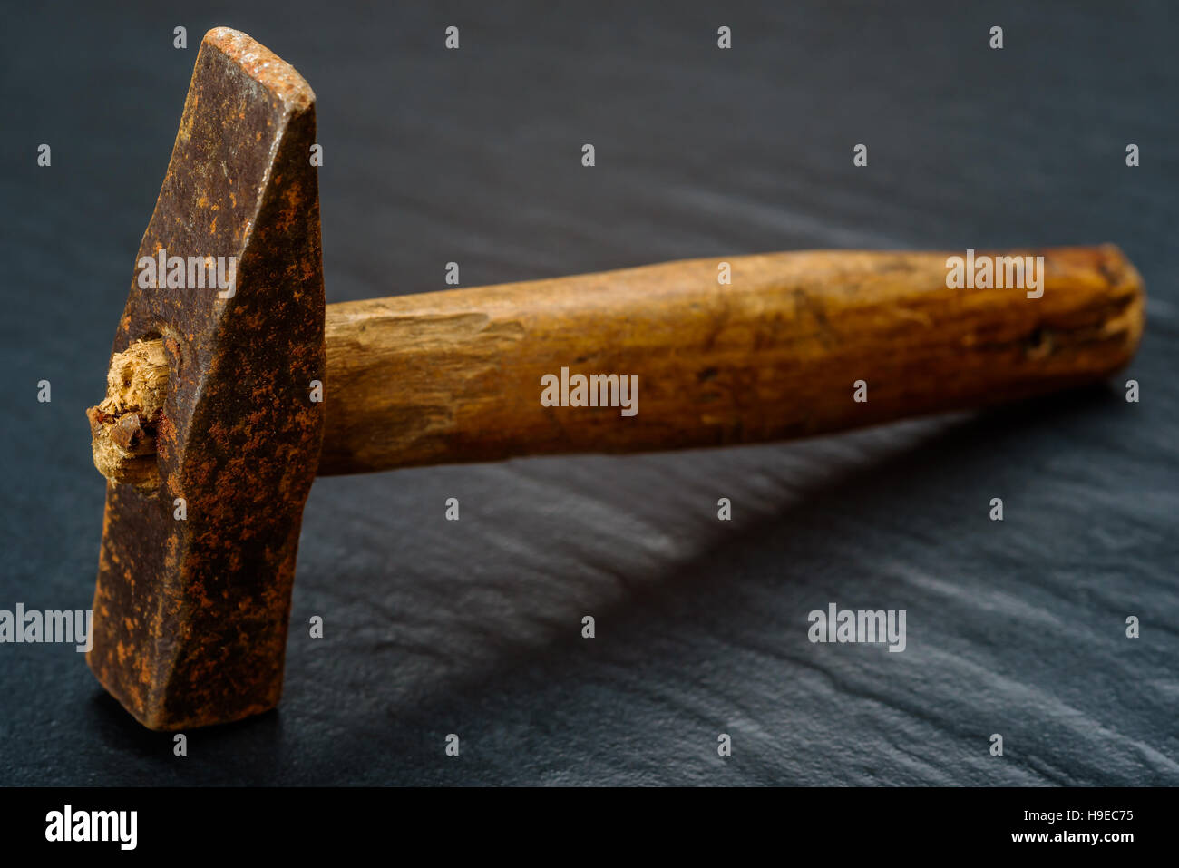 Old and well used handmade square hammer with short wooden handle Stock ...