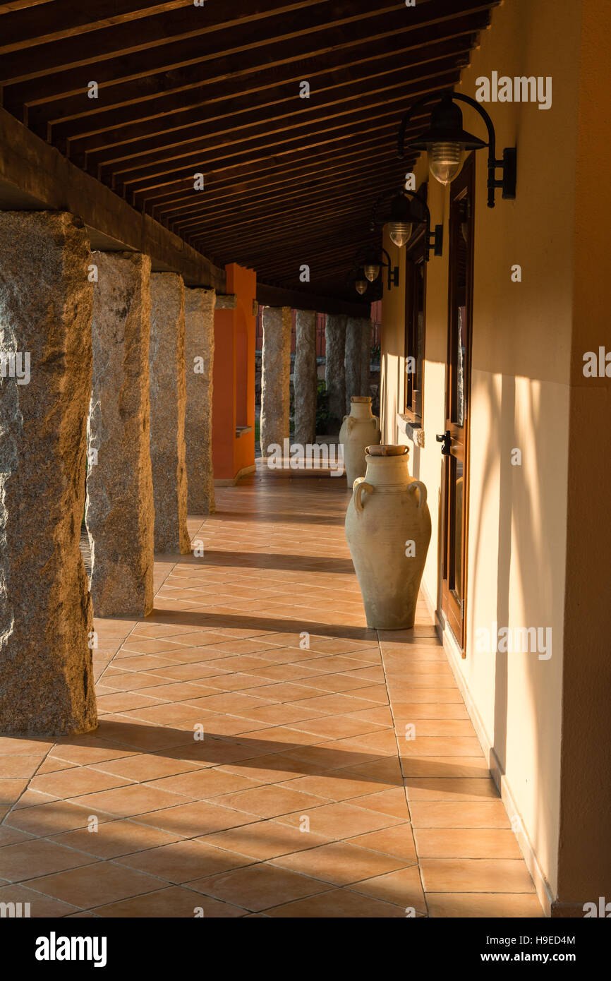 Colonnade Courtyard with Stone Columns and Ornamental Vase in ...