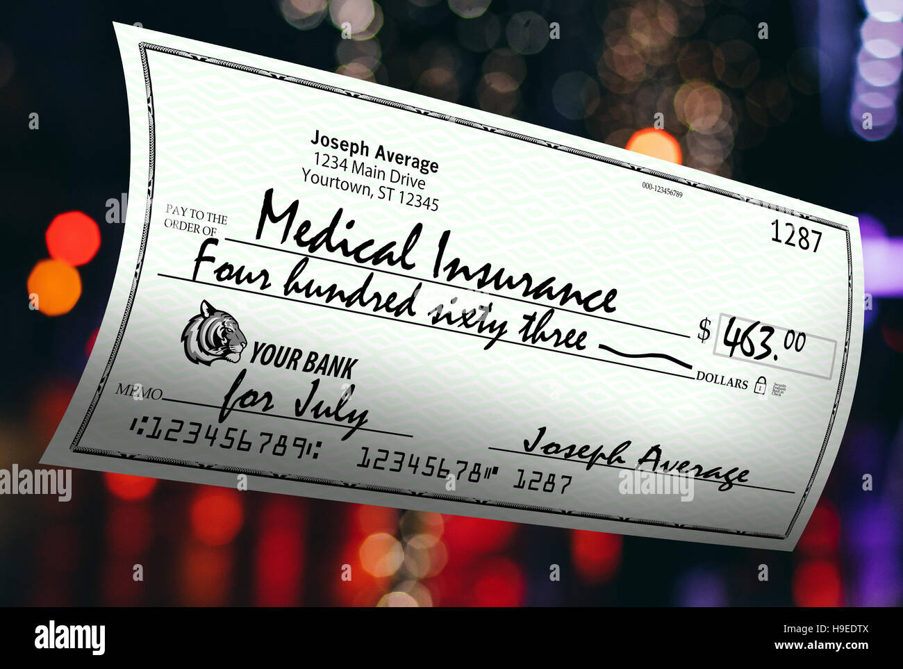 Medical insurance payment check Stock Photo - Alamy