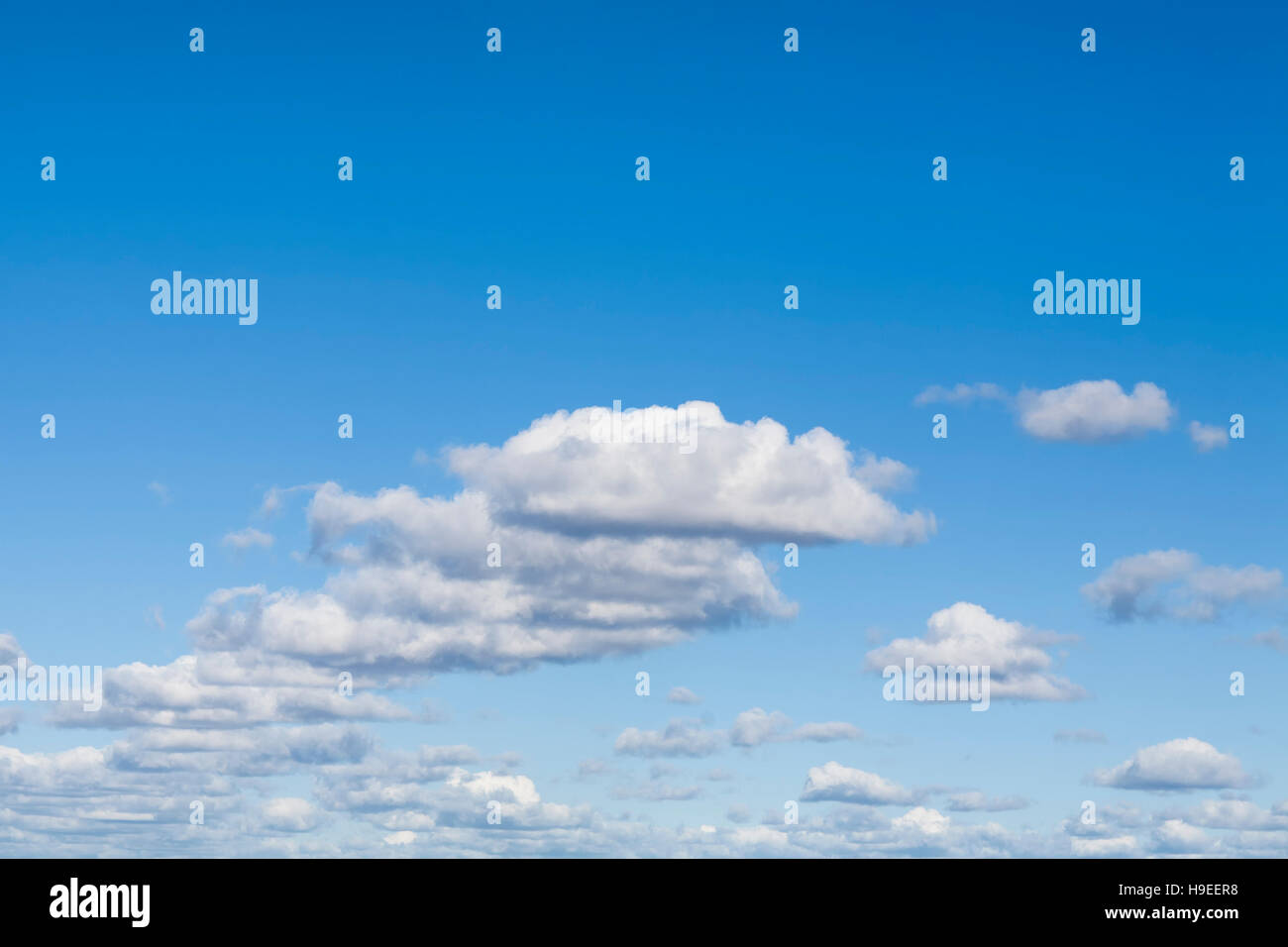 Fresh white fluffy clouds on a clear blue summer sky Model Release: No. Property Release: No ...