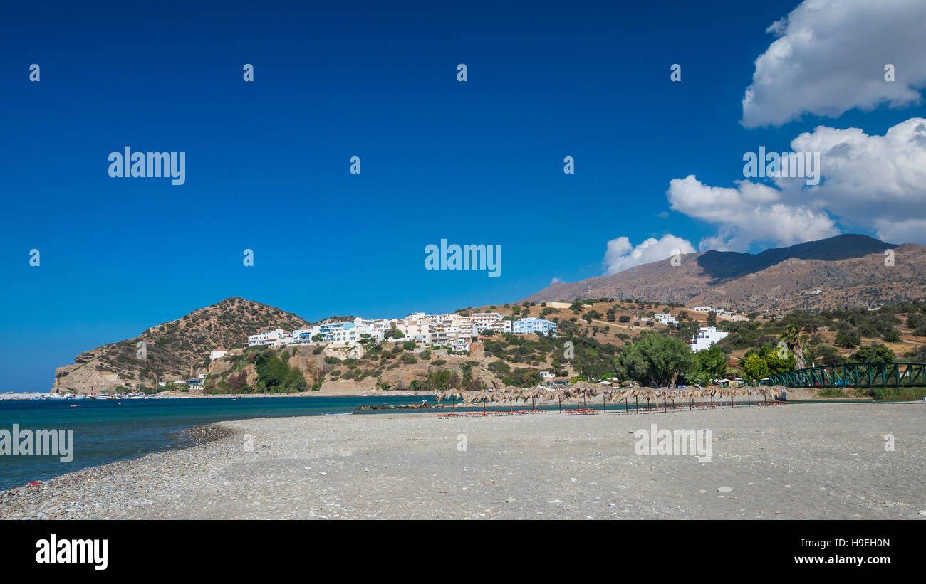 Agia Galini Beach in Crete island, Greece. Tourists relax and bath in ...