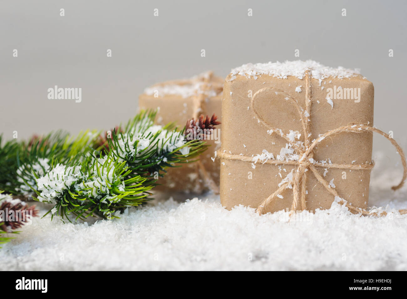gift boxes of kraft paper with spruce branches Stock Photo - Alamy