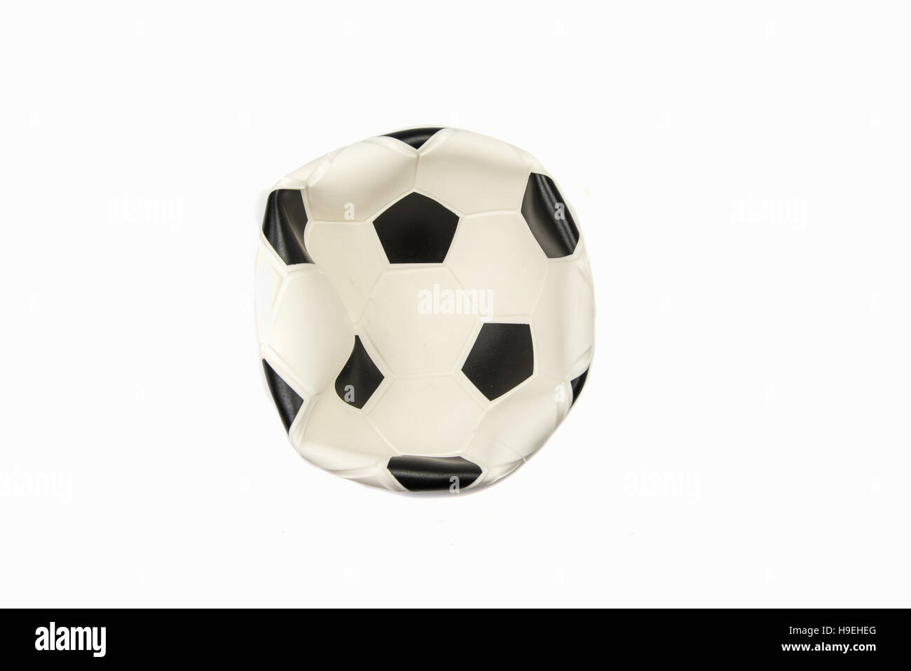 New deflated soccer ball isolated on white background Stock Photo - Alamy
