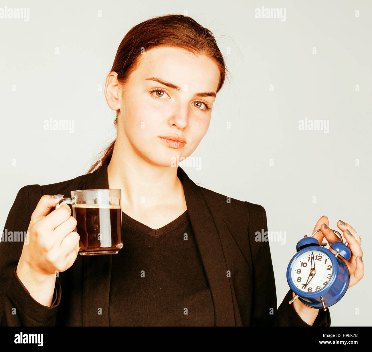 young beauty woman in business style costume waking up for work Stock ...