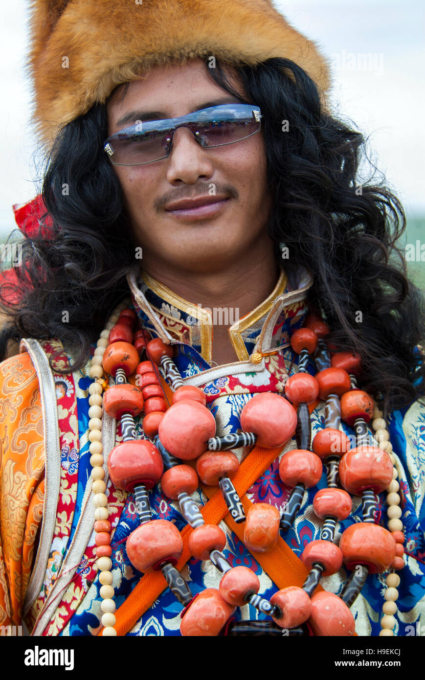 Khampa horseman, dressed in their finest and most decorative outfits ...