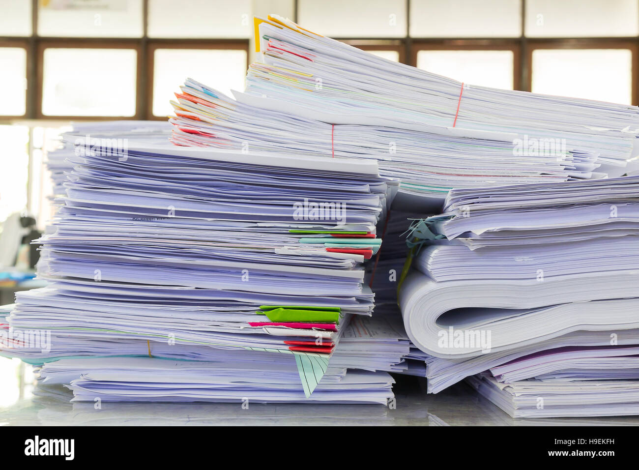 Business Concept, Pile of unfinished business documents on office desk ...