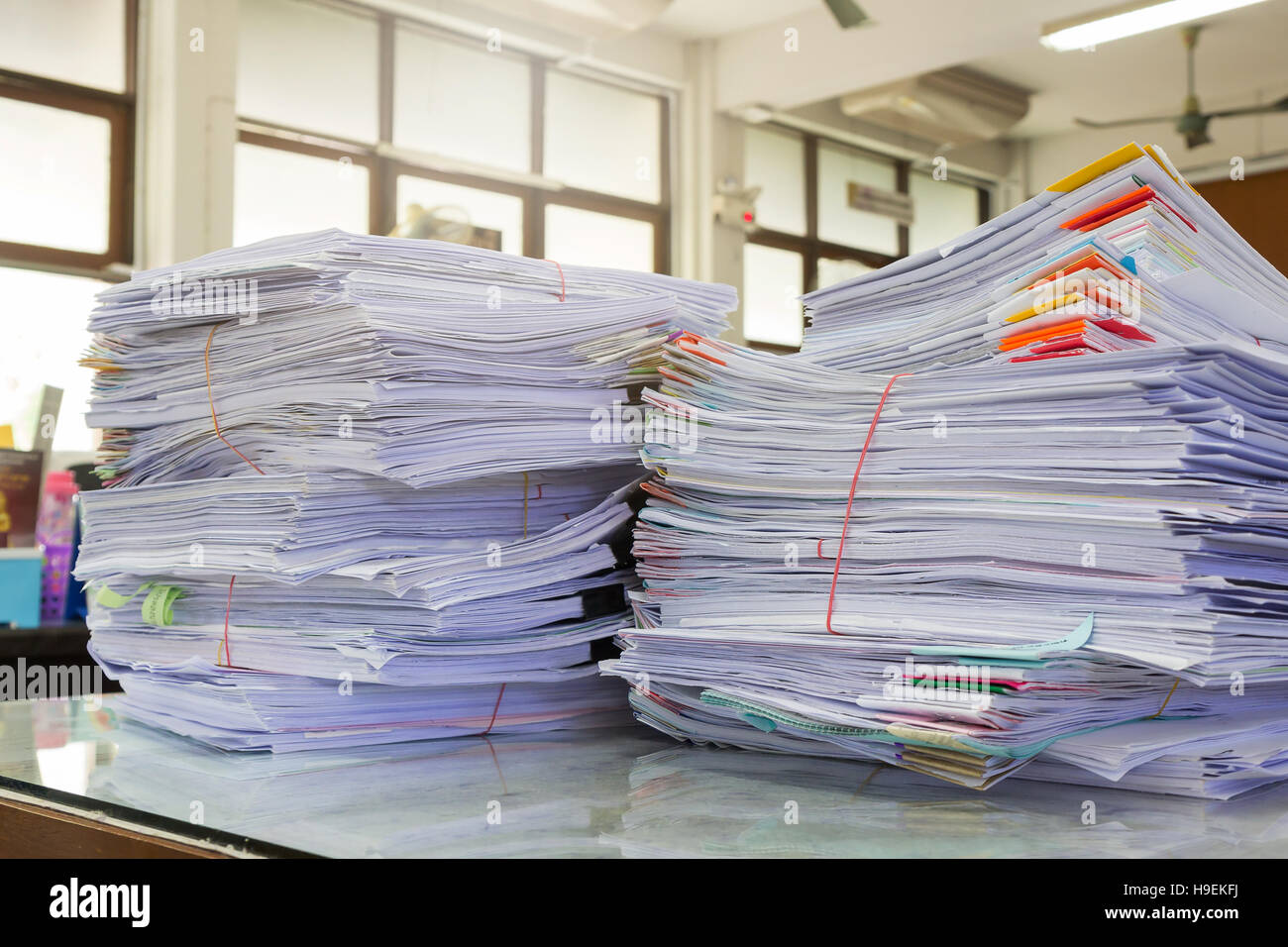 Business Concept, Pile of unfinished business documents on office desk ...