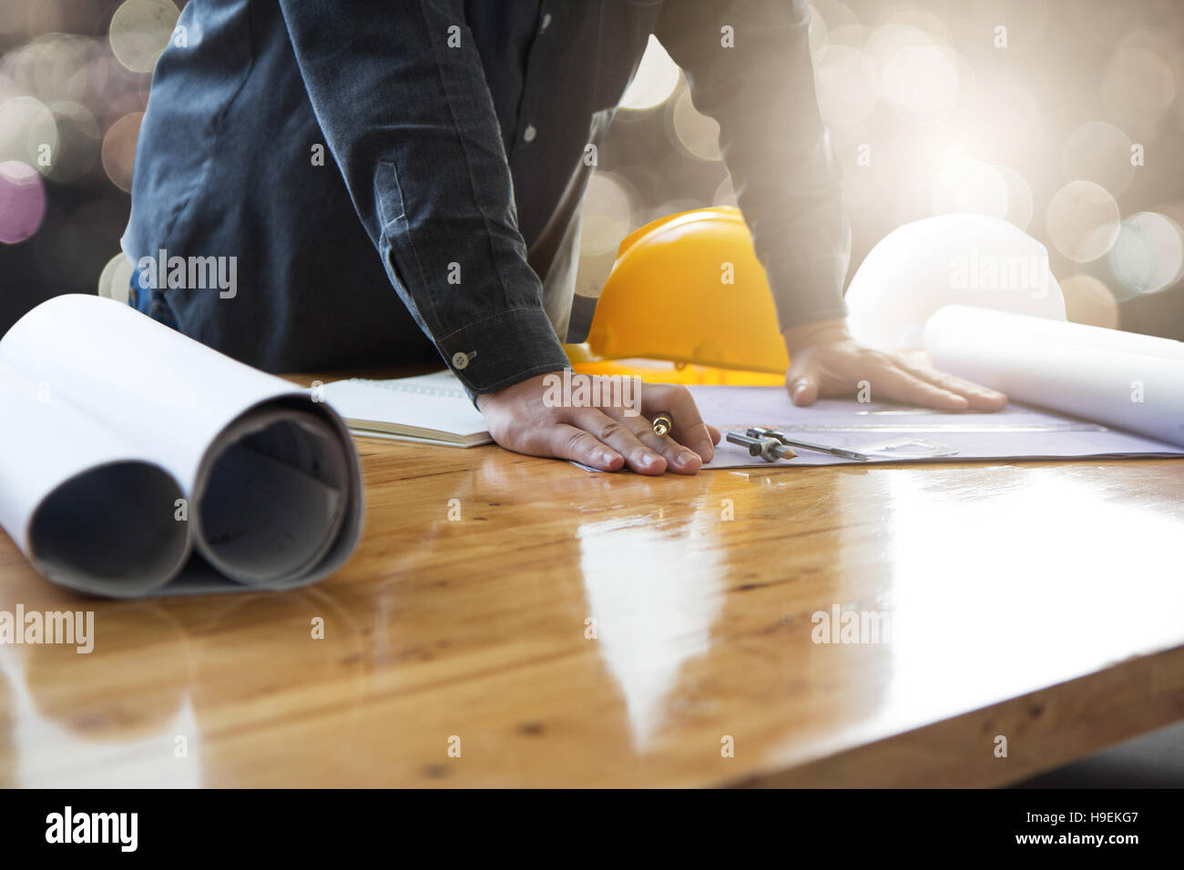 Architect concept, Architects working with blueprints in the office ...