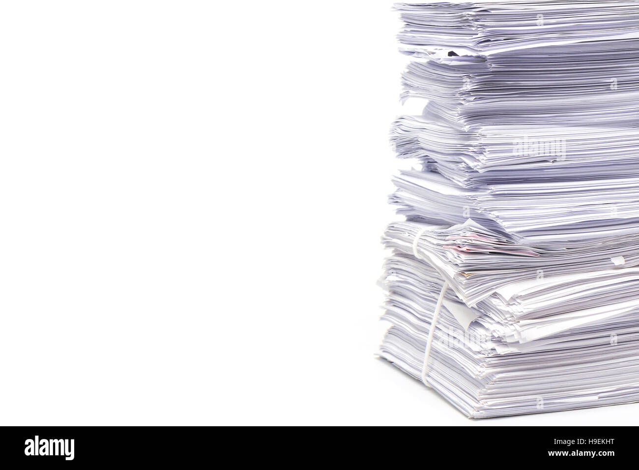 Stack of business papers isolated on white background Stock Photo - Alamy