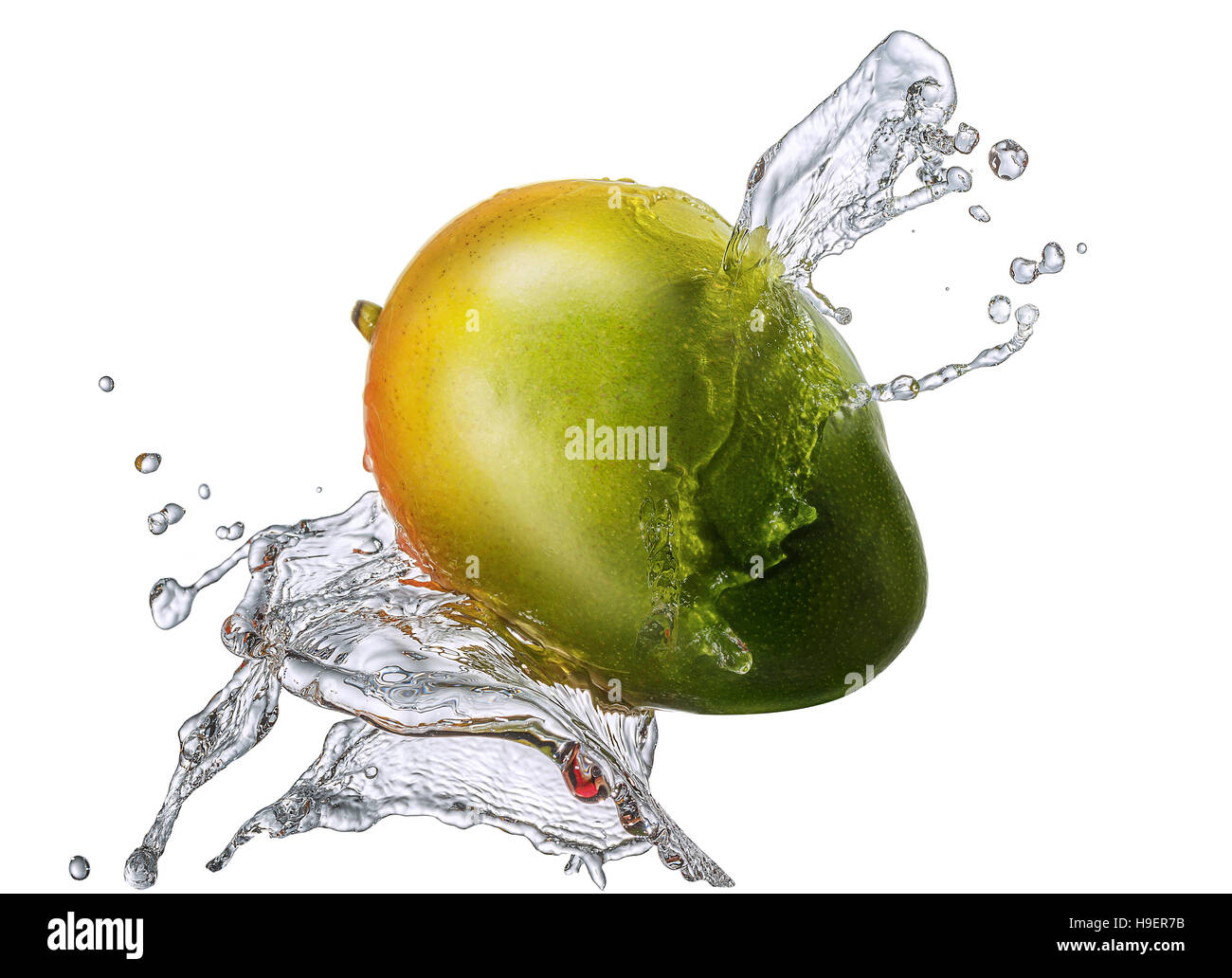 Water splash with mango isolated Stock Photo - Alamy