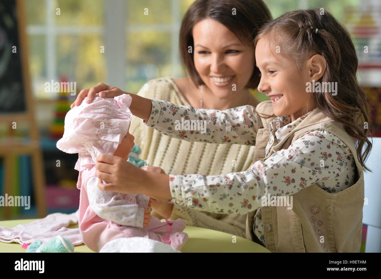 Mother and daughter play Stock Photo - Alamy