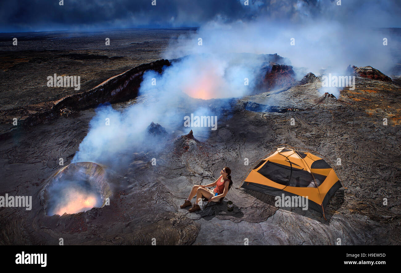 Woman camping with tent on volcano Stock Photo - Alamy