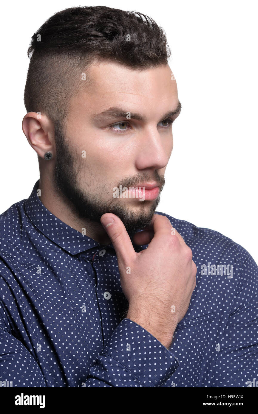 Thoughtful young man Stock Photo - Alamy