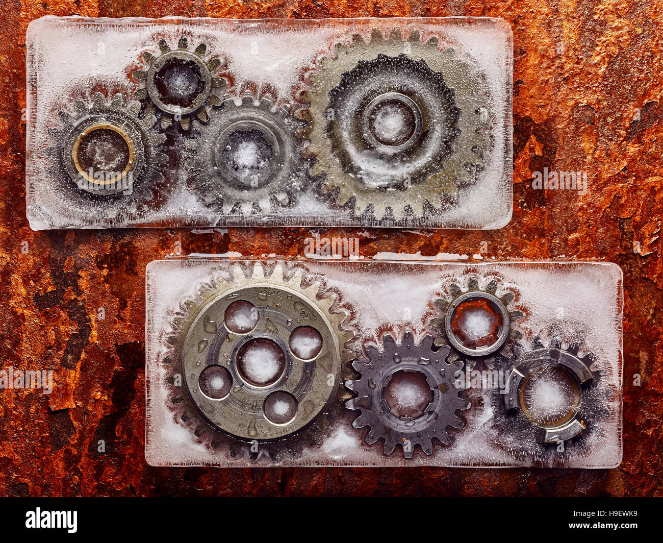 Gears frozen in ice Stock Photo - Alamy