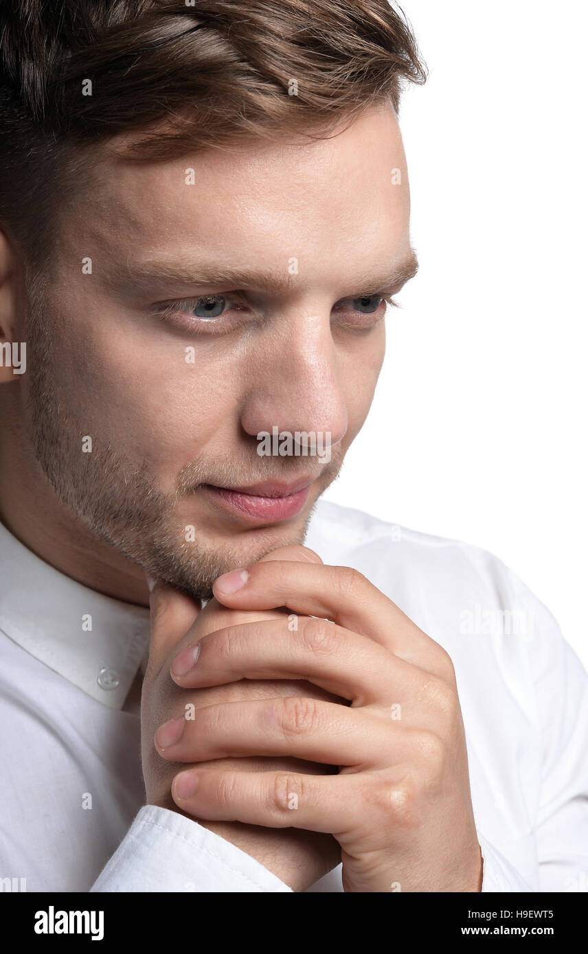 Thoughtful young man Stock Photo - Alamy