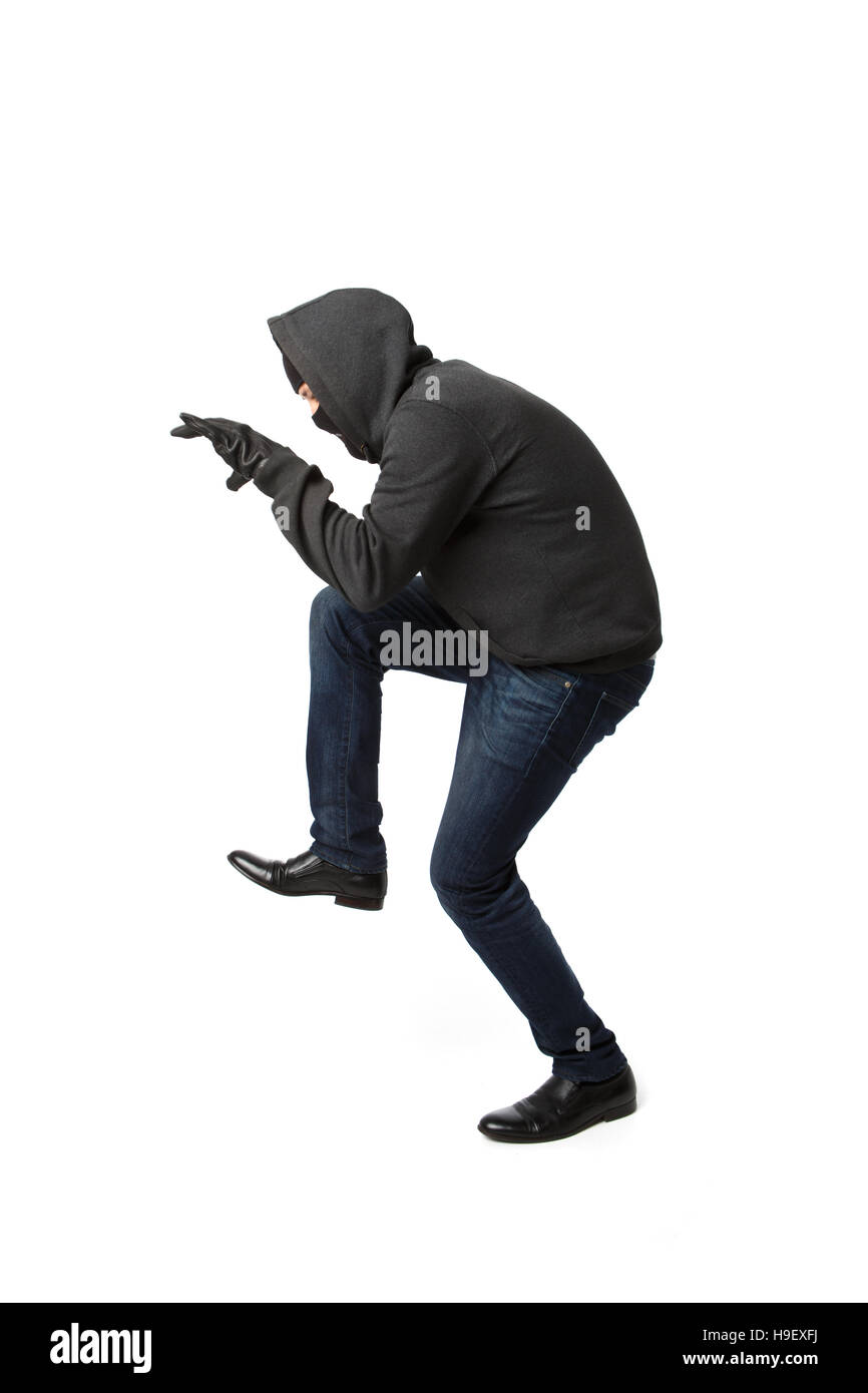 Thief isolated on blank background Stock Photo - Alamy
