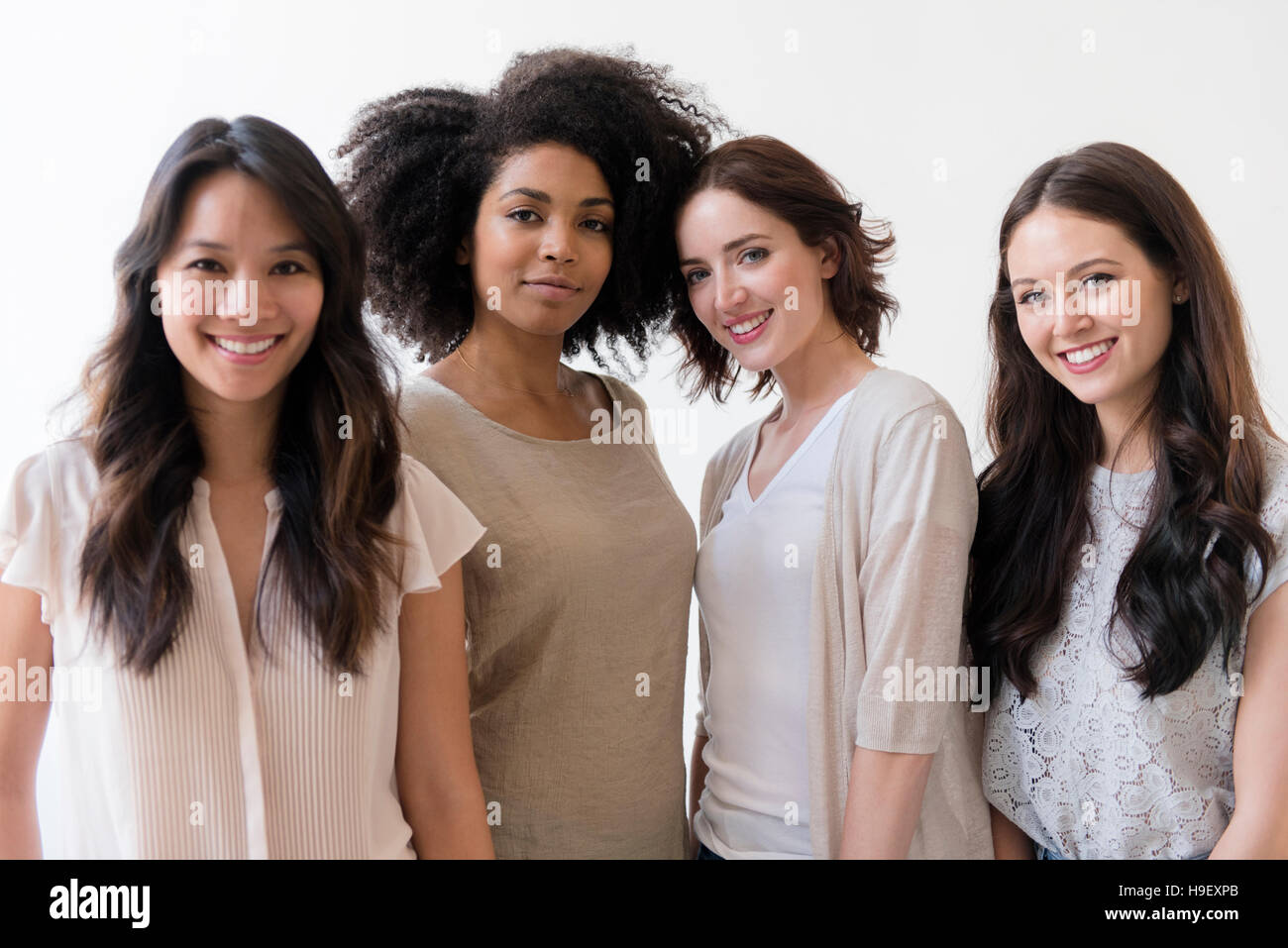 Portrait of smiling women Stock Photo - Alamy