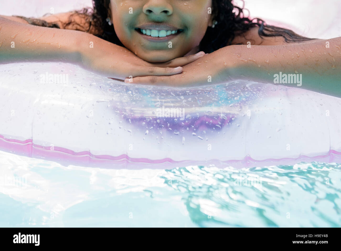 Girl playing in inflatable tube hi-res stock photography and images - Alamy