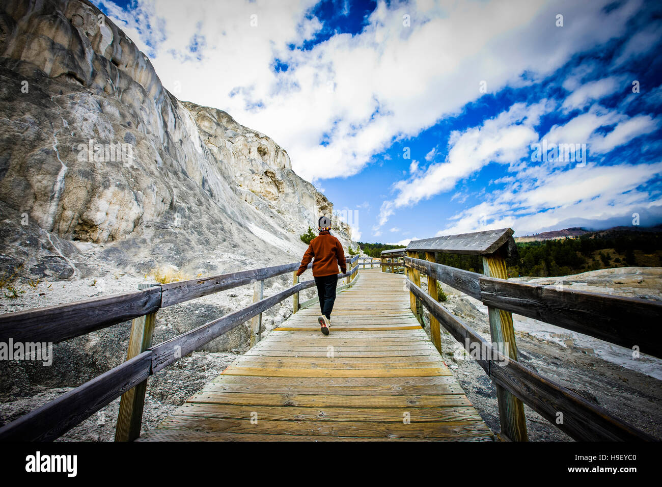 Japanese woman walking on boardwalk Stock Photo - Alamy