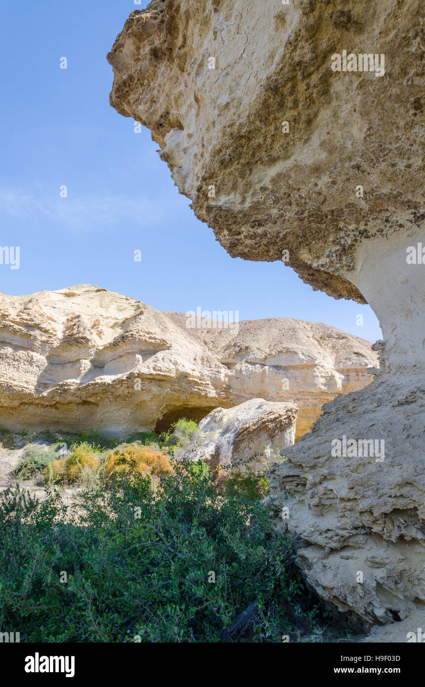 Natural rock formations and sparse vegetation at Lake Arco in Angola's ...